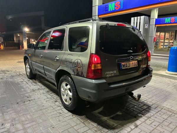 Dzeltens Mazda Tribute 2002 Viļņa, ar dzinēja tilpumu 1.99 L un nobraukumu 238 tūkst. km par 1240 €, foto 3 vietnē AUTOMOTO.COM.LV