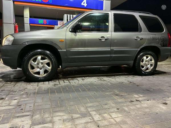 Dzeltens Mazda Tribute 2002 Viļņa, ar dzinēja tilpumu 1.99 L un nobraukumu 238 tūkst. km par 1240 €, foto 5 vietnē AUTOMOTO.COM.LV