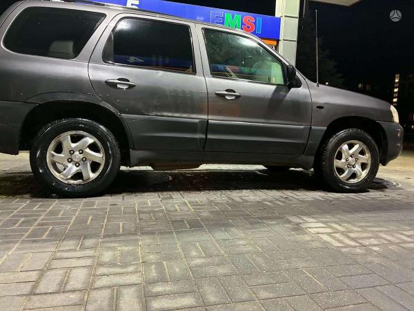 Dzeltens Mazda Tribute 2002 Viļņa, ar dzinēja tilpumu 1.99 L un nobraukumu 238 tūkst. km par 1240 €, foto 6 vietnē AUTOMOTO.COM.LV