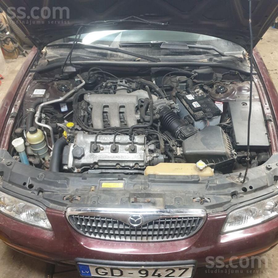 Красный Мазда Кседос 9 1998 в Рига, объемом двигателя 2.50 л и пробегом 166 тыс. км за 1234 €, фото 1 на AUTOMOTO.COM.LV
