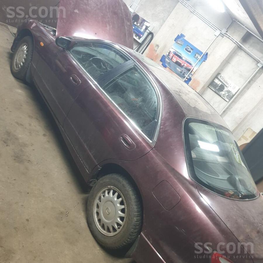 Красный Мазда Кседос 9 1998 в Рига, объемом двигателя 2.50 л и пробегом 166 тыс. км за 1234 €, фото 4 на AUTOMOTO.COM.LV