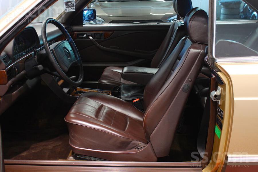 Yellow Mercedes-Benz 500 1985 in Riga, with an engine capacity of 5.00 L and mileage of 85 thousand km for 43000 €, photo 11 on AUTOMOTO.COM.LV