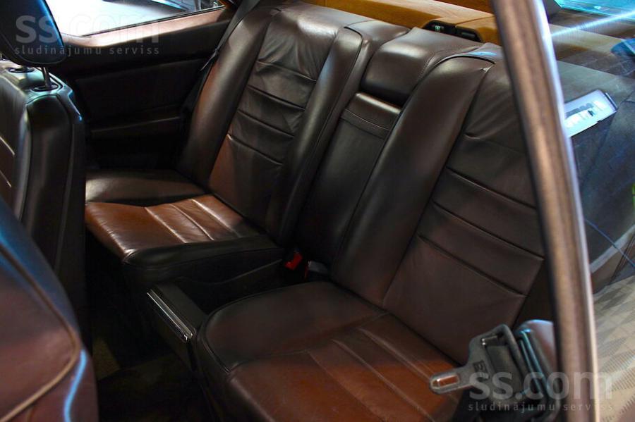 Yellow Mercedes-Benz 500 1985 in Riga, with an engine capacity of 5.00 L and mileage of 85 thousand km for 43000 €, photo 14 on AUTOMOTO.COM.LV