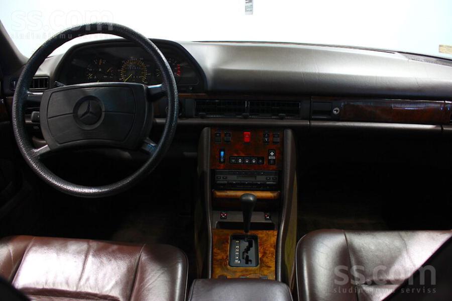 Yellow Mercedes-Benz 500 1985 in Riga, with an engine capacity of 5.00 L and mileage of 85 thousand km for 43000 €, photo 26 on AUTOMOTO.COM.LV