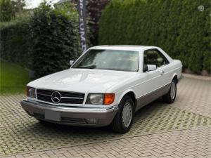 Balts Mercedes-Benz 560 1989 Kauņa, ar dzinēja tilpumu 5.55 L un nobraukumu 189 tūkst. km par 20000 €, foto  vietnē AUTOMOTO.COM.LV