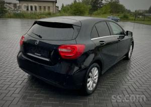 Black Mercedes-Benz A 180 2013 in Vilnius, with an engine capacity of 1.80 L and mileage of 233 thousand km for 8299 €, photo 4 on AUTOMOTO.COM.LV