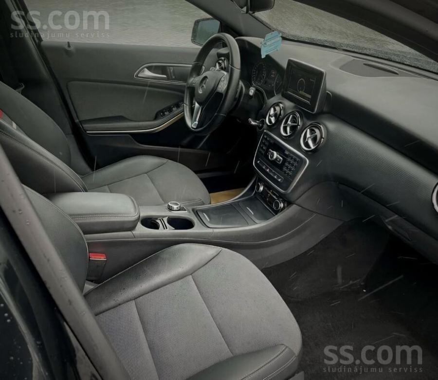 Black Mercedes-Benz A 180 2013 in Vilnius, with an engine capacity of 1.80 L and mileage of 233 thousand km for 8299 €, photo 12 on AUTOMOTO.COM.LV