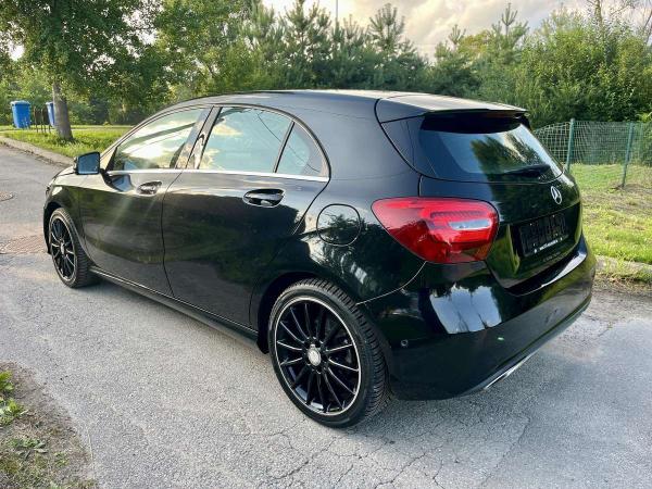 Black Mercedes-Benz A 180 2016 in Kelme, with an engine capacity of 1.60 L and mileage of 158 thousand km for 4700 €, photo 4 on AUTOMOTO.COM.LV