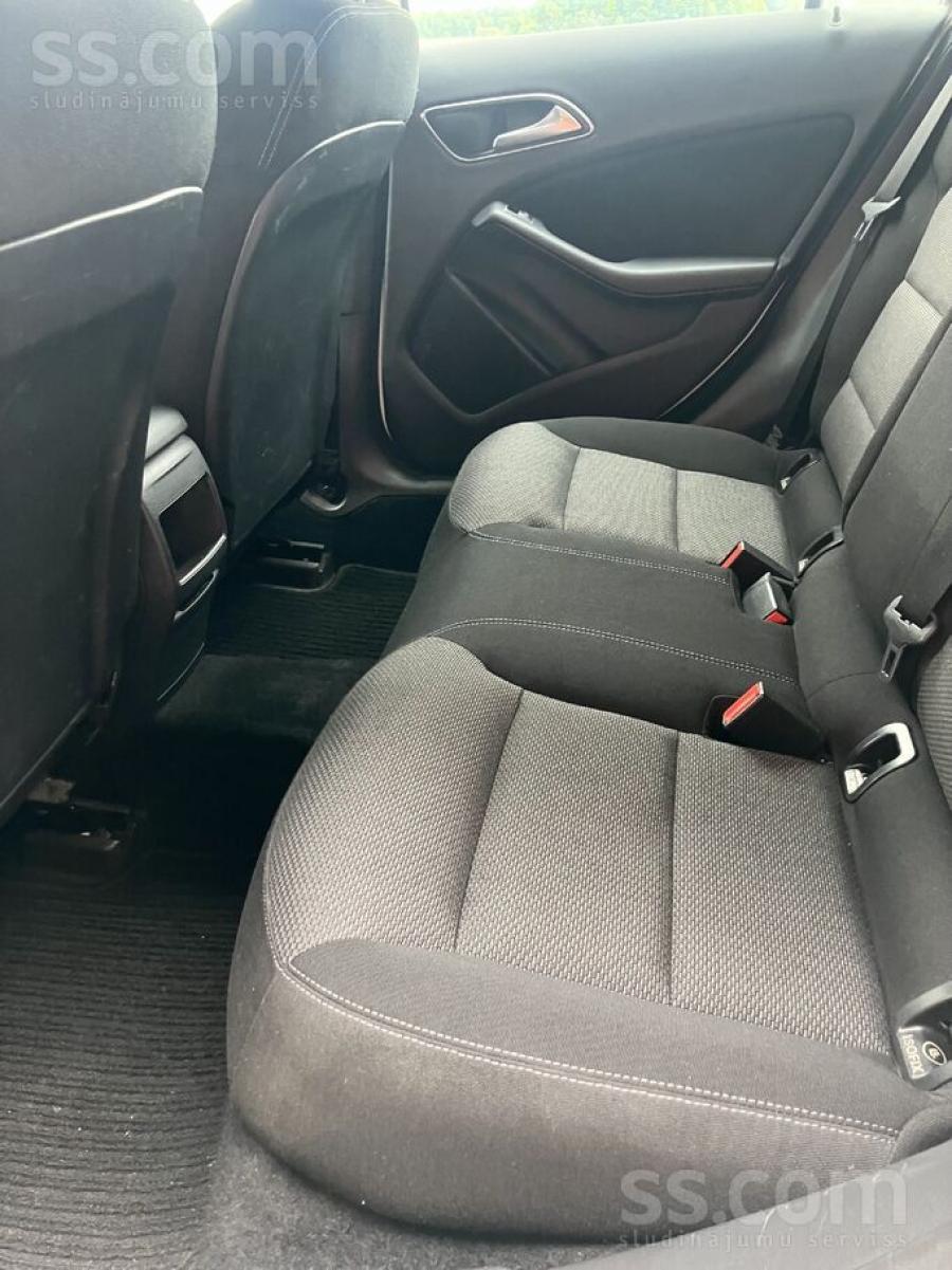 White Mercedes-Benz A 180 2013 in Talsi, with an engine capacity of 1.50 L and mileage of 223 thousand km for 7999 €, photo 14 on AUTOMOTO.COM.LV
