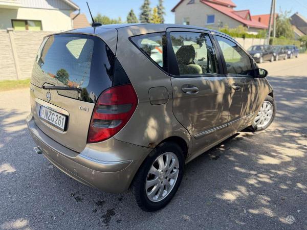 Yellow Mercedes-Benz A 200 2005 in Kaunas, with an engine capacity of 2.04 L and mileage of 215 thousand km for 1250 €, photo 7 on AUTOMOTO.COM.LV