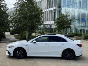 White Mercedes-Benz A 35 AMG 2020 in Vilnius, with an engine capacity of 2.00 L and mileage of 74 thousand km for 28990 €, photo 4 on AUTOMOTO.COM.LV