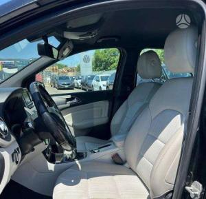 Black Mercedes-Benz B 180 2013 in Siauliai, with an engine capacity of 1.46 L and mileage of 290 thousand km for 3950 €, photo 11 on AUTOMOTO.COM.LV
