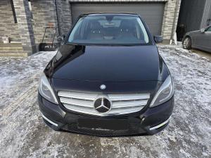 Black Mercedes-Benz B 180 2014 in Vilnius, with an engine capacity of 1.46 L and mileage of 245 thousand km for 6777 €, photo 2 on AUTOMOTO.COM.LV