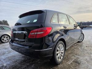 Black Mercedes-Benz B 180 2014 in Vilnius, with an engine capacity of 1.46 L and mileage of 245 thousand km for 6777 €, photo 6 on AUTOMOTO.COM.LV