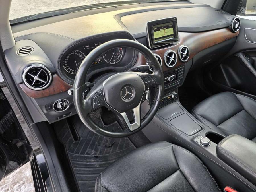 Black Mercedes-Benz B 180 2014 in Vilnius, with an engine capacity of 1.46 L and mileage of 245 thousand km for 6777 €, photo 17 on AUTOMOTO.COM.LV