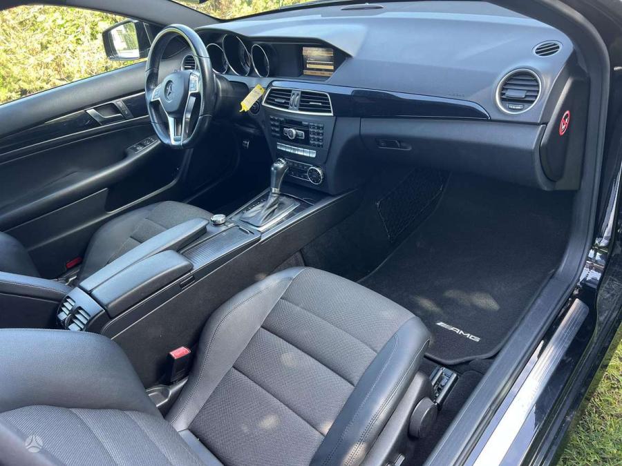 Black Mercedes-Benz C 180 2011 in Kaunas, with an engine capacity of 1.80 L and mileage of 219 thousand km for 7350 €, photo 12 on AUTOMOTO.COM.LV