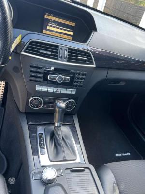 Black Mercedes-Benz C 180 2011 in Kaunas, with an engine capacity of 1.80 L and mileage of 219 thousand km for 7350 €, photo 14 on AUTOMOTO.COM.LV