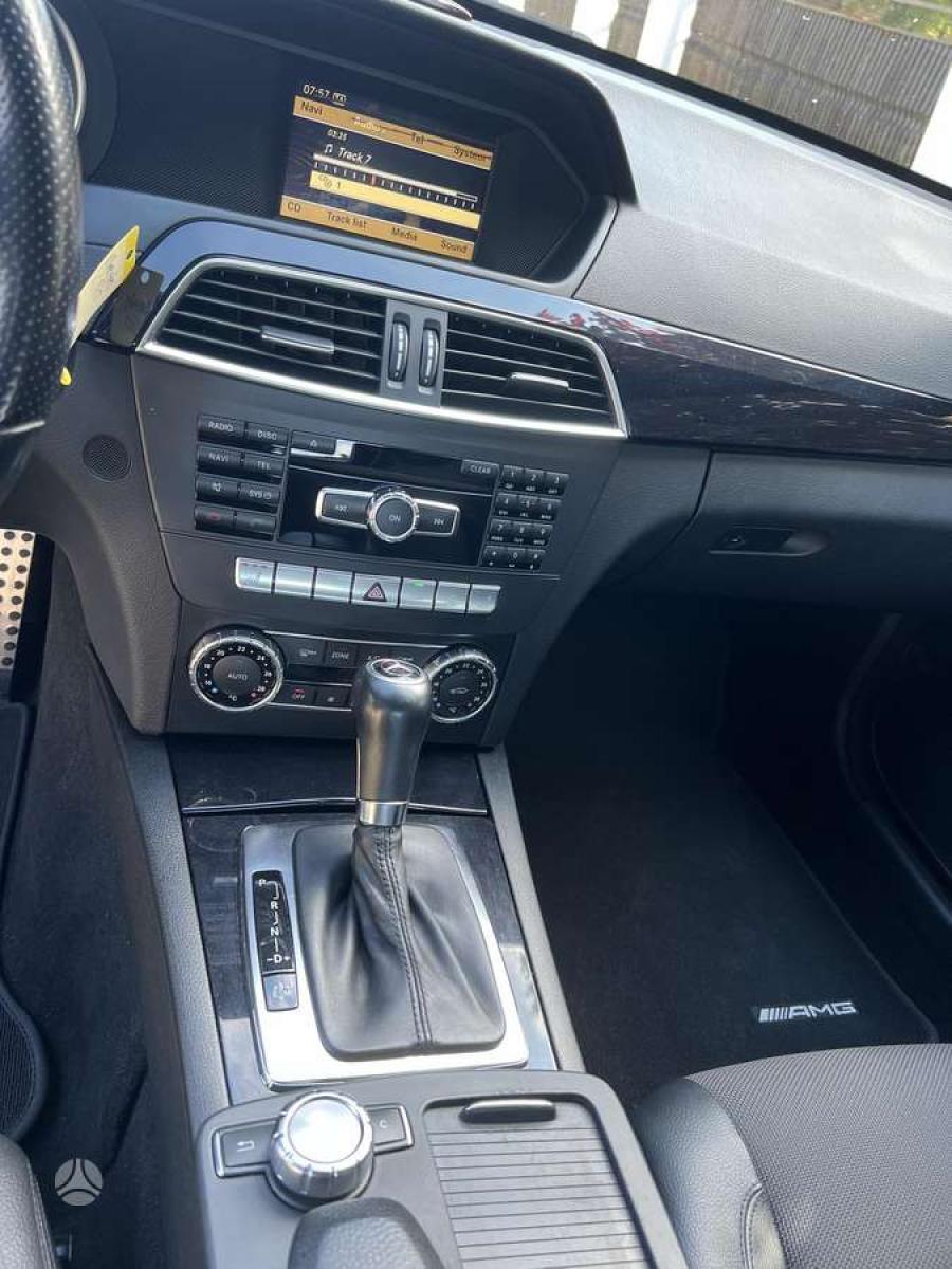 Black Mercedes-Benz C 180 2011 in Kaunas, with an engine capacity of 1.80 L and mileage of 219 thousand km for 7350 €, photo 14 on AUTOMOTO.COM.LV