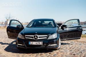 Black Mercedes-Benz C 180 2012 in Riga, with an engine capacity of 1.80 L and mileage of 151 thousand km for 9400 €, photo 4 on AUTOMOTO.COM.LV