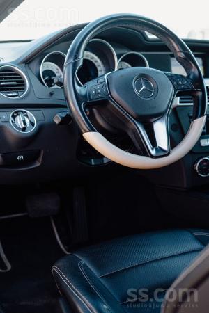 Black Mercedes-Benz C 180 2012 in Riga, with an engine capacity of 1.80 L and mileage of 151 thousand km for 9400 €, photo 12 on AUTOMOTO.COM.LV