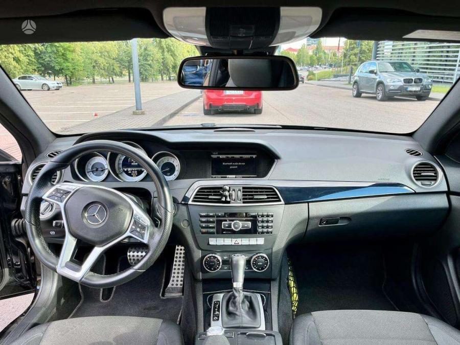 Black Mercedes-Benz C 180 2013 in Vilnius, with an engine capacity of 1.60 L and mileage of 196 thousand km for 10200 €, photo 14 on AUTOMOTO.COM.LV