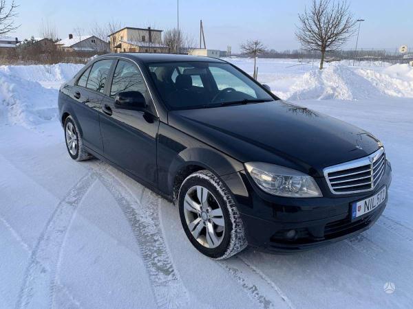 Black Mercedes-Benz C 180 2008 in Panevezys, with an engine capacity of 1.80 L and mileage of 245 thousand km for 3600 €, photo 1 on AUTOMOTO.COM.LV