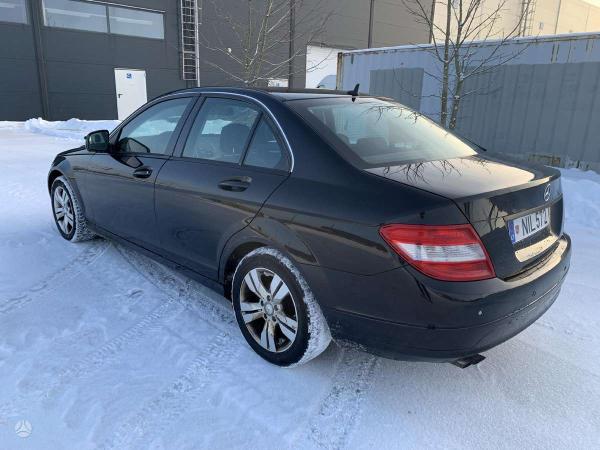 Black Mercedes-Benz C 180 2008 in Panevezys, with an engine capacity of 1.80 L and mileage of 245 thousand km for 3600 €, photo 5 on AUTOMOTO.COM.LV