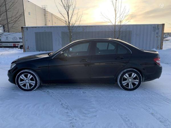 Black Mercedes-Benz C 180 2008 in Panevezys, with an engine capacity of 1.80 L and mileage of 245 thousand km for 3600 €, photo 6 on AUTOMOTO.COM.LV