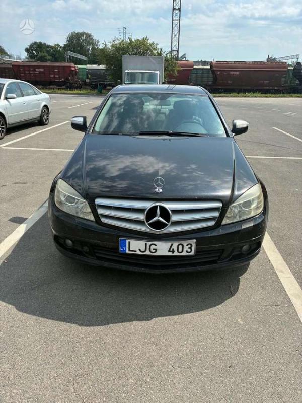 Black Mercedes-Benz C 180 2008 in Kaunas, with an engine capacity of 1.80 L and mileage of 395 thousand km for 2500 €, photo 1 on AUTOMOTO.COM.LV