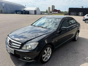 Black Mercedes-Benz C 180 2010 in Kaunas, with an engine capacity of 1.80 L and mileage of 256 thousand km for 5500 €, photo  on AUTOMOTO.COM.LV