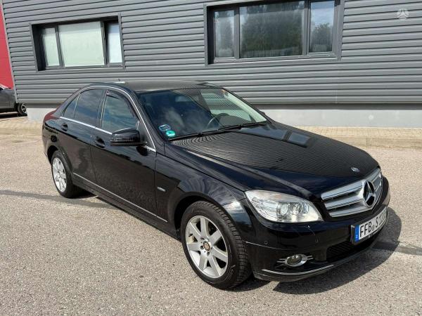 Black Mercedes-Benz C 180 2010 in Kaunas, with an engine capacity of 1.80 L and mileage of 256 thousand km for 5500 €, photo 2 on AUTOMOTO.COM.LV