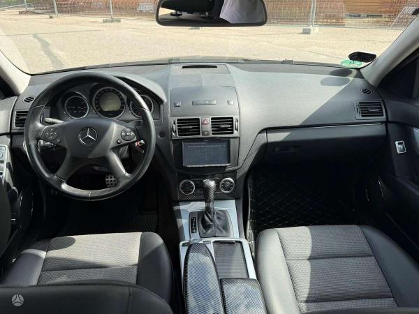 Black Mercedes-Benz C 180 2010 in Kaunas, with an engine capacity of 1.80 L and mileage of 256 thousand km for 5500 €, photo 9 on AUTOMOTO.COM.LV