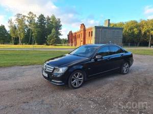 Black Mercedes-Benz C 180 2011 in Liepaja, with an engine capacity of 1.80 L and mileage of 197 thousand km for 8880 €, photo  on AUTOMOTO.COM.LV