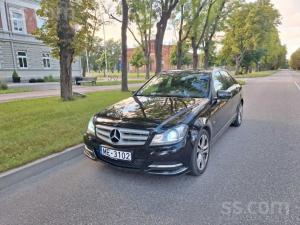 Black Mercedes-Benz C 180 2011 in Liepaja, with an engine capacity of 1.80 L and mileage of 197 thousand km for 8880 €, photo 5 on AUTOMOTO.COM.LV