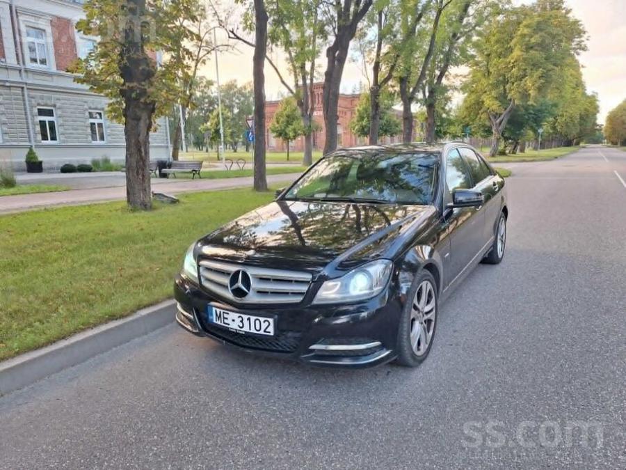 Black Mercedes-Benz C 180 2011 in Liepaja, with an engine capacity of 1.80 L and mileage of 197 thousand km for 8880 €, photo 5 on AUTOMOTO.COM.LV