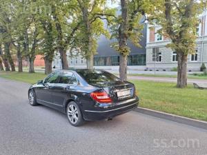 Black Mercedes-Benz C 180 2011 in Liepaja, with an engine capacity of 1.80 L and mileage of 197 thousand km for 8880 €, photo 6 on AUTOMOTO.COM.LV