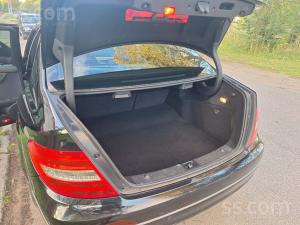 Black Mercedes-Benz C 180 2011 in Liepaja, with an engine capacity of 1.80 L and mileage of 197 thousand km for 8880 €, photo 7 on AUTOMOTO.COM.LV