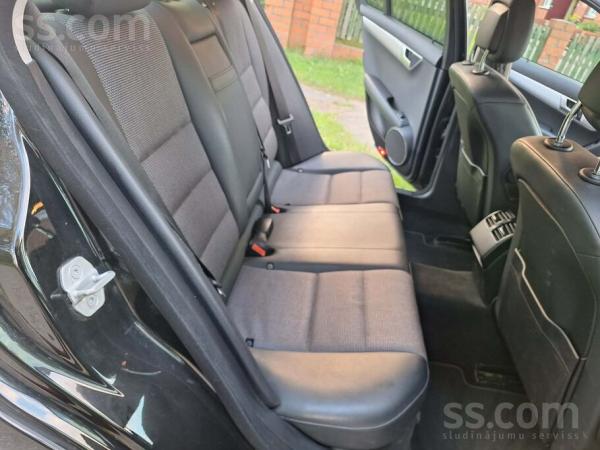 Black Mercedes-Benz C 180 2011 in Liepaja, with an engine capacity of 1.80 L and mileage of 197 thousand km for 8880 €, photo 10 on AUTOMOTO.COM.LV