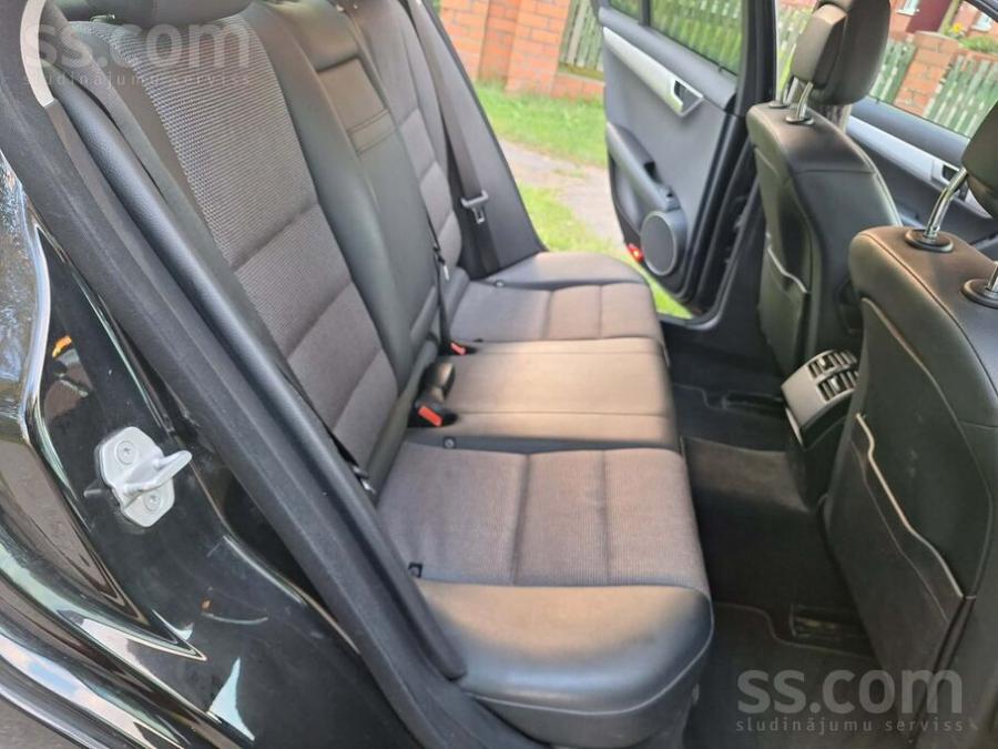 Black Mercedes-Benz C 180 2011 in Liepaja, with an engine capacity of 1.80 L and mileage of 197 thousand km for 8880 €, photo 11 on AUTOMOTO.COM.LV
