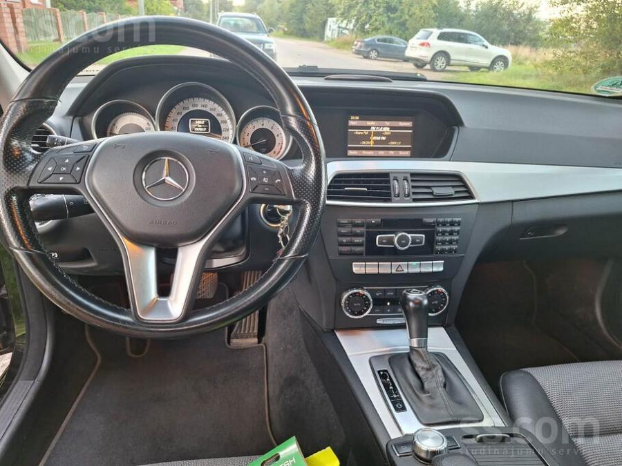 Black Mercedes-Benz C 180 2011 in Liepaja, with an engine capacity of 1.80 L and mileage of 197 thousand km for 8880 €, photo 12 on AUTOMOTO.COM.LV