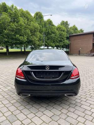 Black Mercedes-Benz C 180 2014 in Kaisiadorys, with an engine capacity of 1.60 L and mileage of 192 thousand km for 12999 €, photo 13 on AUTOMOTO.COM.LV