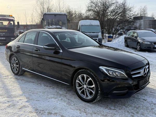 Black Mercedes-Benz C 180 2015 in Alytus, with an engine capacity of 1.60 L and mileage of 300 thousand km for 8799 €, photo 2 on AUTOMOTO.COM.LV
