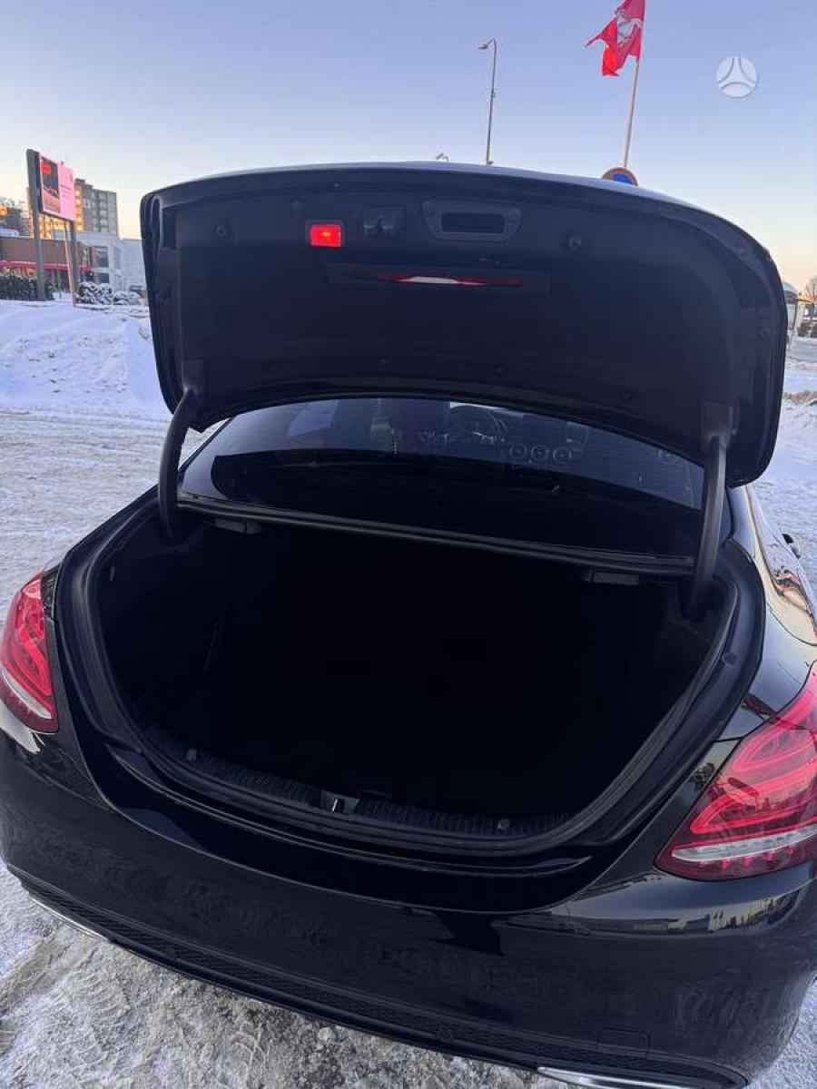 Black Mercedes-Benz C 180 2015 in Kaunas, with an engine capacity of 1.60 L and mileage of 252 thousand km for 12750 €, photo 14 on AUTOMOTO.COM.LV