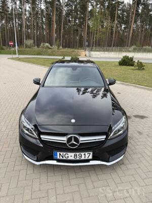 Black Mercedes-Benz C 180 2017 in Riga, with an engine capacity of 1.60 L and mileage of 112 thousand km for 18300 €, photo 4 on AUTOMOTO.COM.LV
