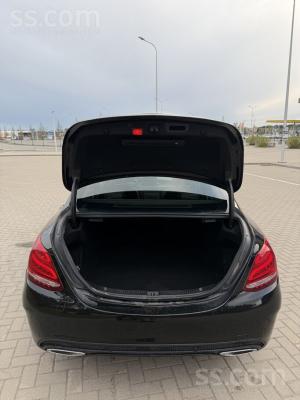 Black Mercedes-Benz C 180 2017 in Riga, with an engine capacity of 1.60 L and mileage of 112 thousand km for 18300 €, photo 8 on AUTOMOTO.COM.LV