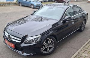 Black Mercedes-Benz C 180 2018 in Kaunas, with an engine capacity of 0.00 L and mileage of 19 thousand km for 24409 €, photo 2 on AUTOMOTO.COM.LV