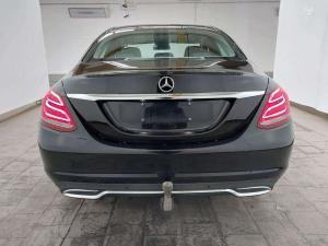 Black Mercedes-Benz C 180 2018 in Kaunas, with an engine capacity of 1.60 L and mileage of 275 thousand km for 12800 €, photo 4 on AUTOMOTO.COM.LV