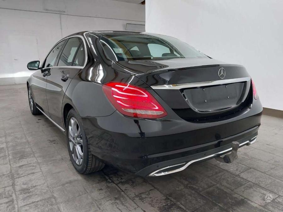 Black Mercedes-Benz C 180 2018 in Kaunas, with an engine capacity of 1.60 L and mileage of 275 thousand km for 12800 €, photo 7 on AUTOMOTO.COM.LV