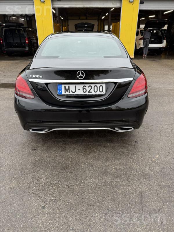 Black Mercedes-Benz C 180 2019 in Riga, with an engine capacity of 1.60 L and mileage of 43 thousand km for 24777 €, photo 6 on AUTOMOTO.COM.LV