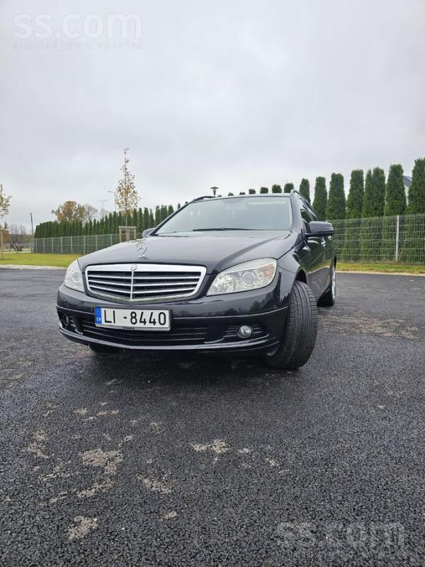 Black Mercedes-Benz C 180 2009 in Jelgava, with an engine capacity of 1.60 L and mileage of 245 thousand km for 2950 €, photo 1 on AUTOMOTO.COM.LV